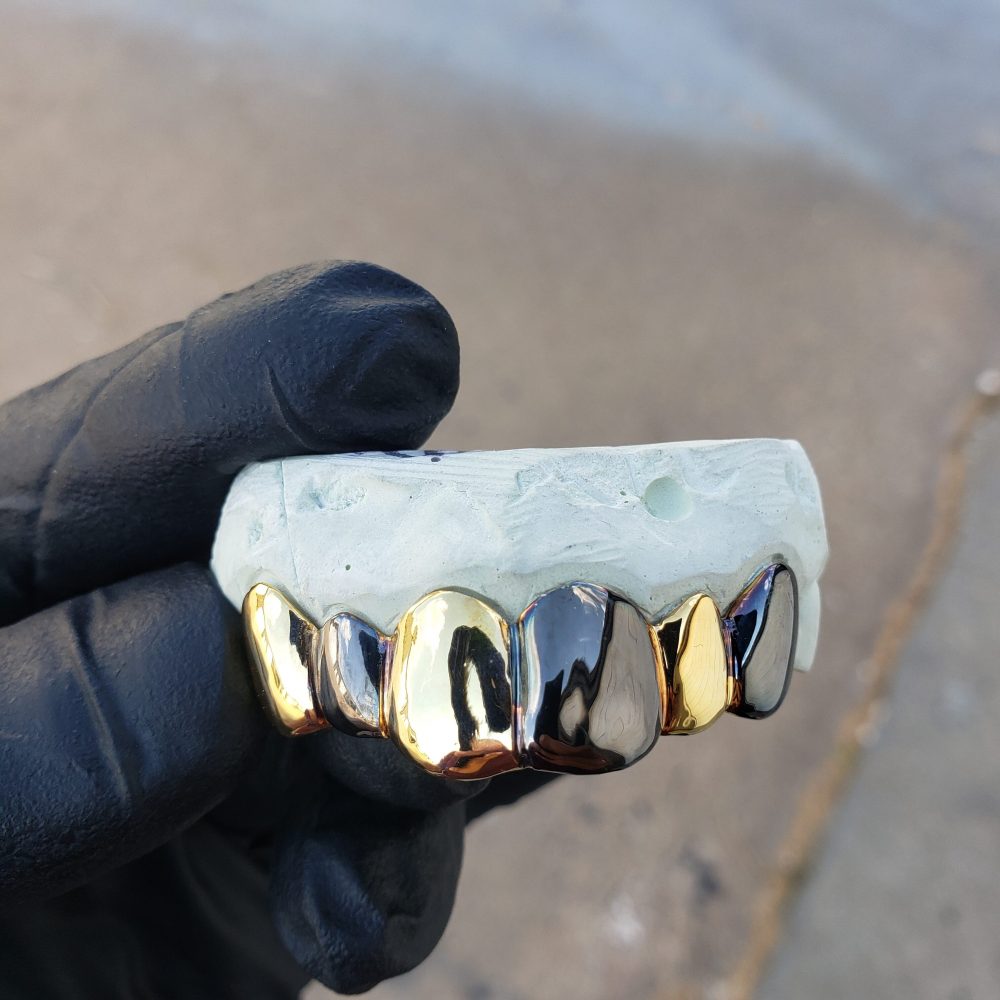 Two Tone Black and Yellow Gold Solid Grillz | GotGrillz Custom Grillz